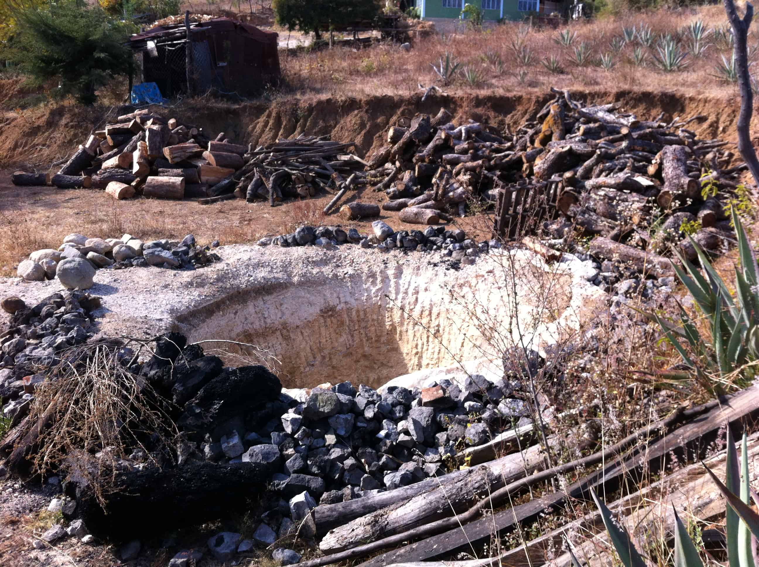 The roasting pit at Palenque Roaguia – Mezcalistas